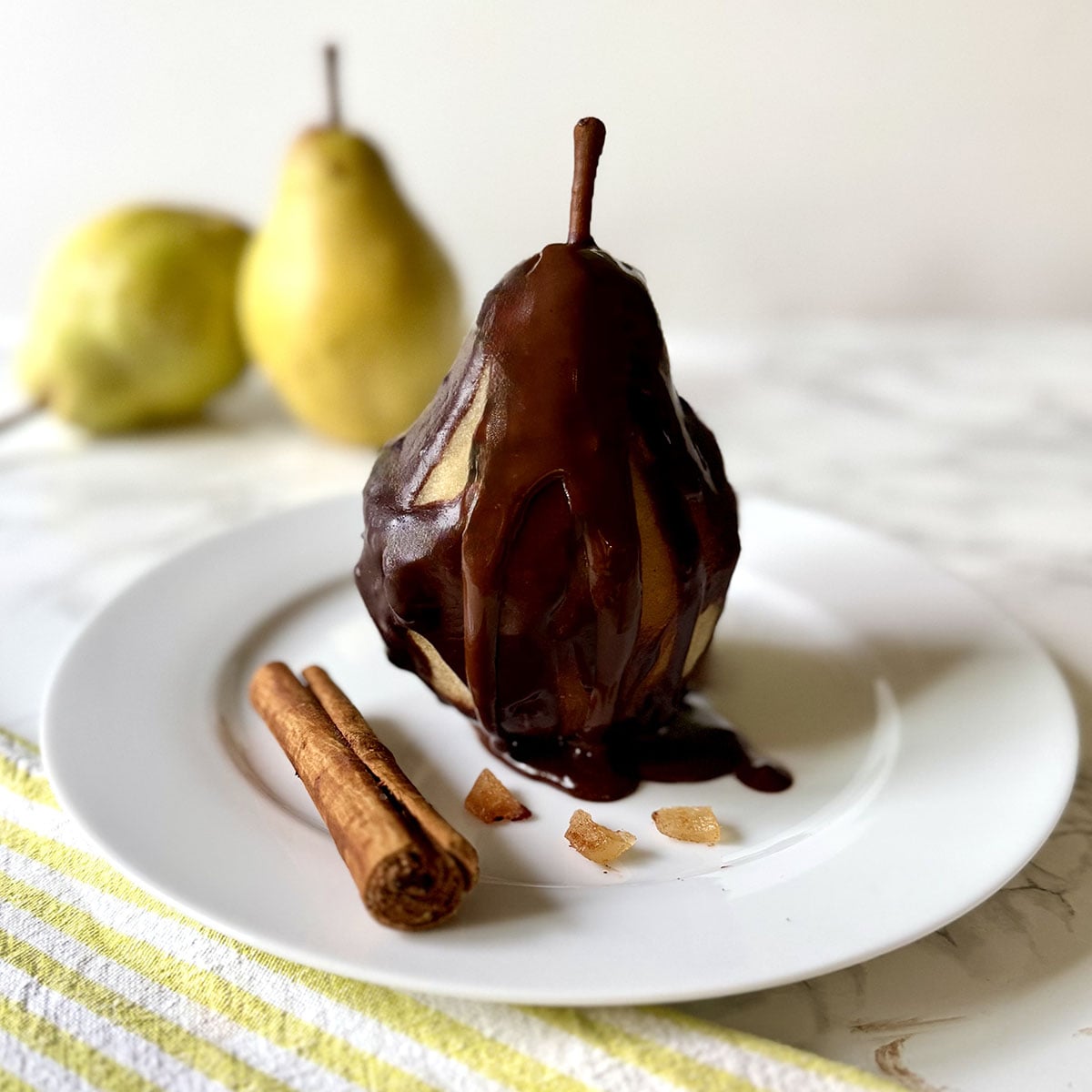 Delicious Chocolate Poached Pears with a Rich Sauce - Recipes from Italy