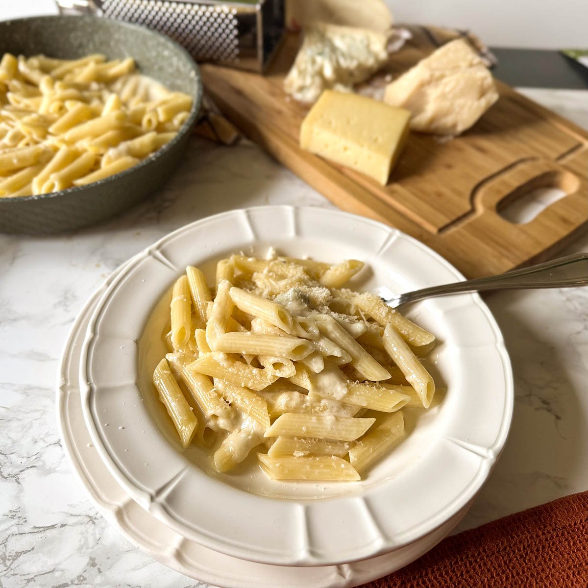 Pasta ai Quattro Formaggi (Four Cheese Pasta Recipe) - Recipes from Italy